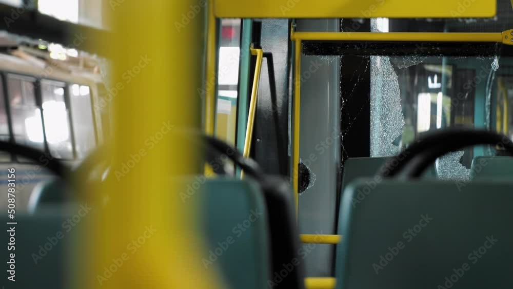 Broken window glass of a trolleybus or bus after an accident. View from ...