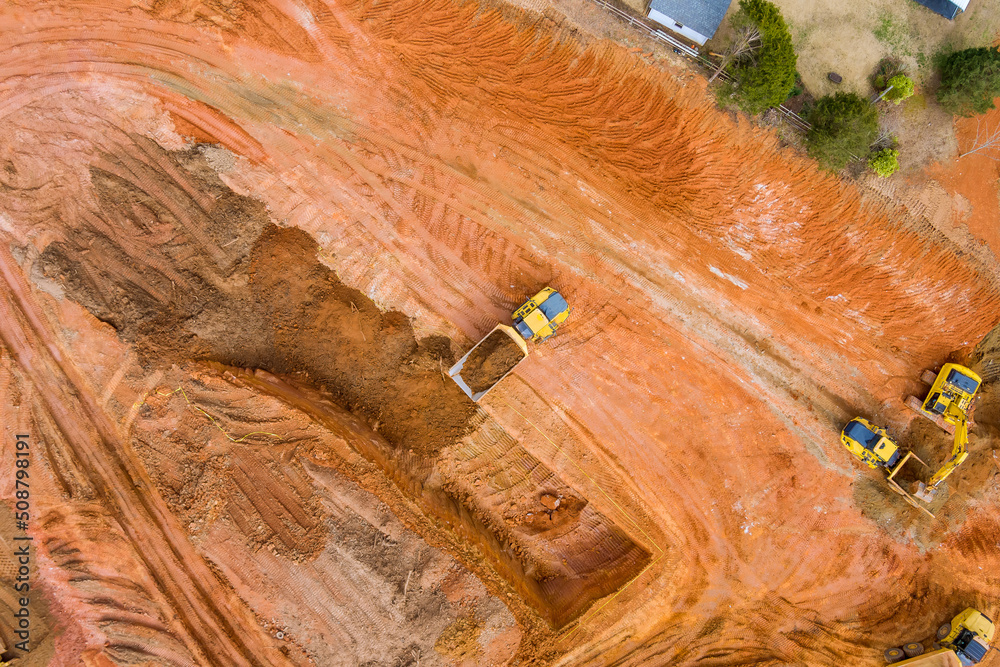 Filling the ground with a large pit the preparing ground for new ...
