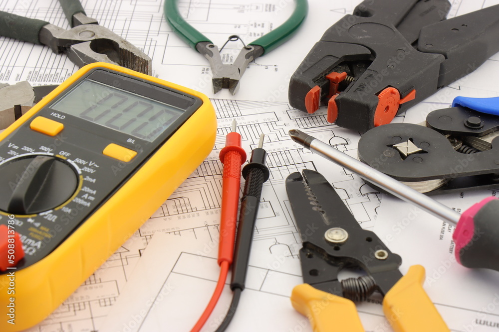 Multimeter and tools for installing an electrical control panel in ...