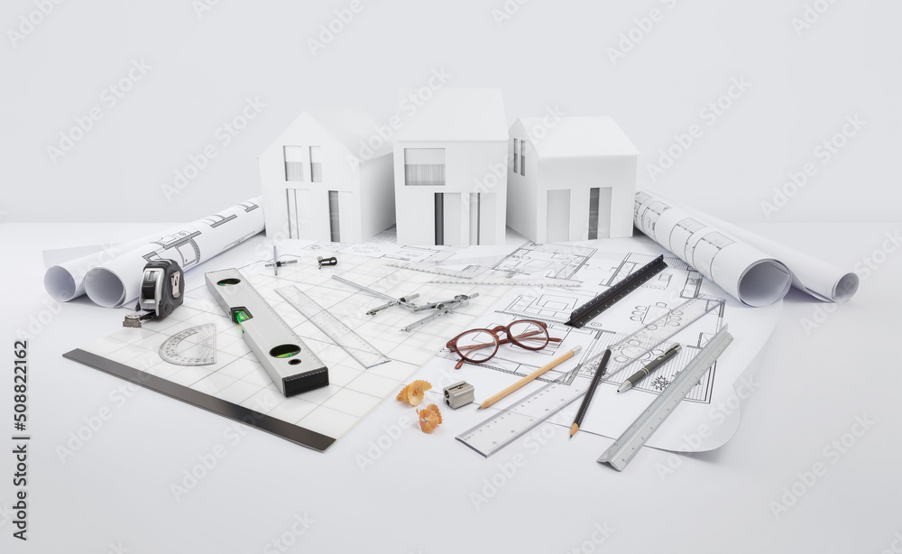 architectural model of houses on blueprint with measurement and drawing ...
