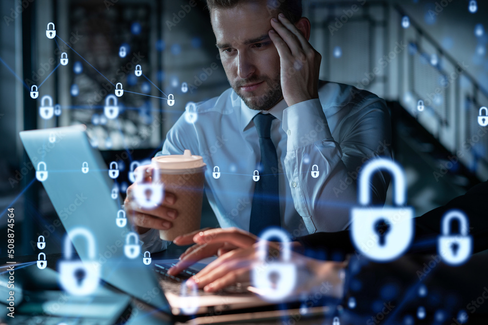 Two colleagues working together to protect clients confidential ...