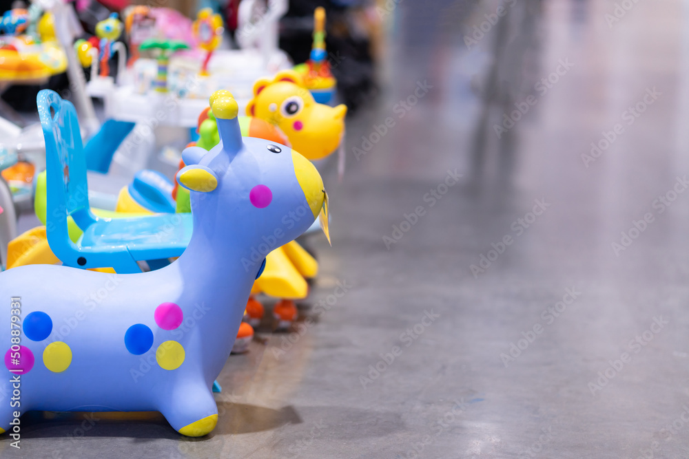 Children's toys, rubber dolls bounce off the bright floor Stock Photo ...