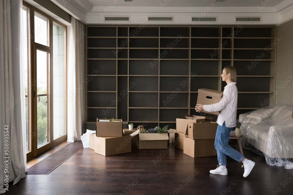 full-length-view-young-25s-woman-carrying-carton-boxes-with-stuff-into