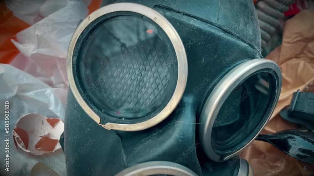 Moscow, 2022: Respirator Gas Mask thrown into the trash. Radioactive ...