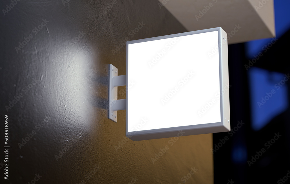 Illuminated wall sign mockup hung on a store facade at night. Street ...