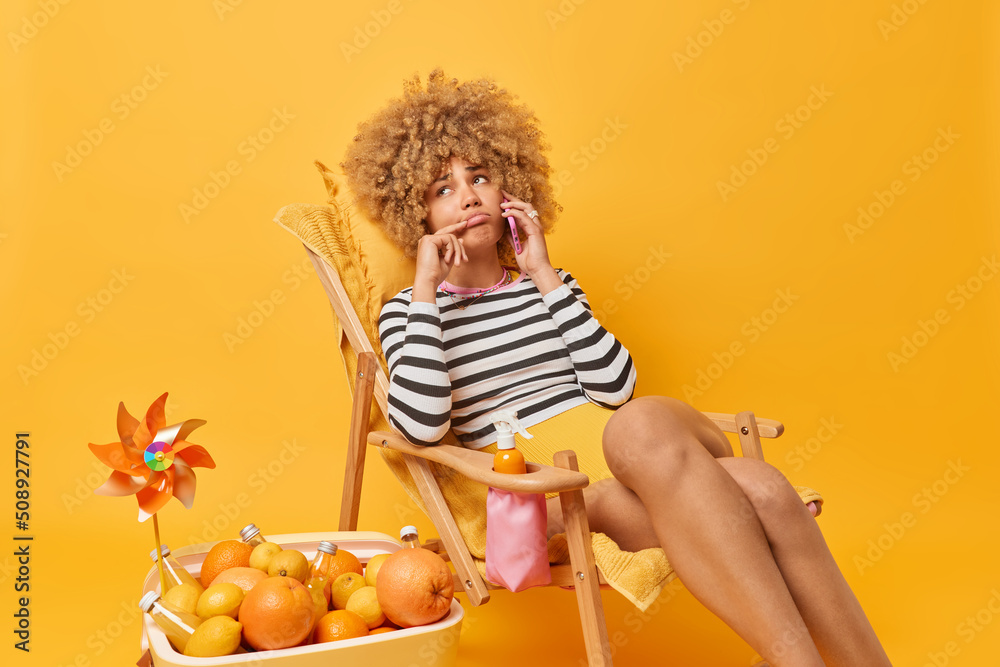 Unhappy frustrated woman has phone conversation with friend looks very ...