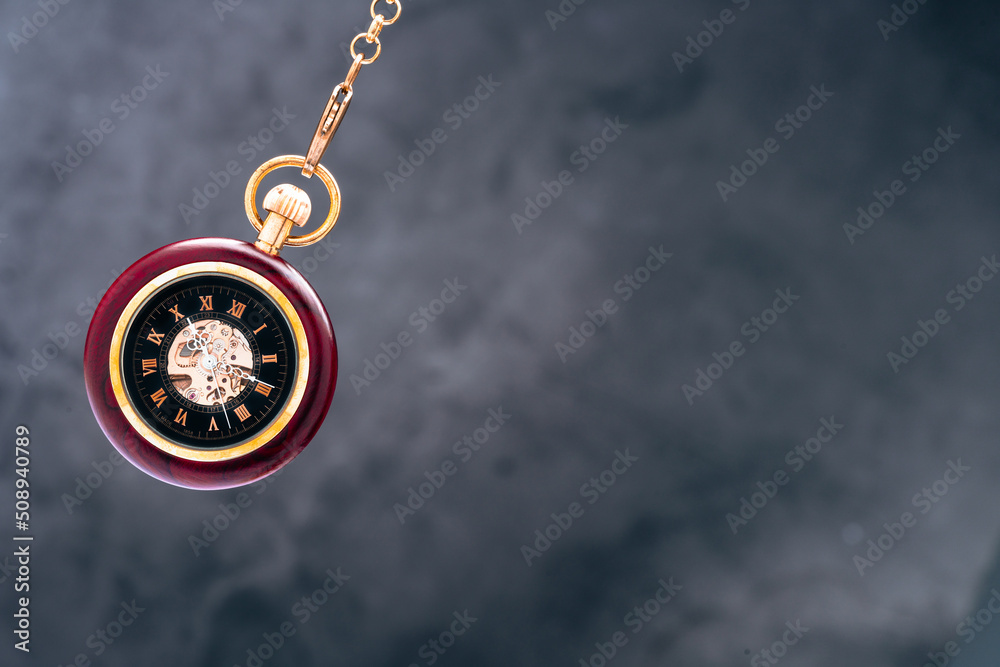 Pocket watch on the black background Stock Photo | Adobe Stock