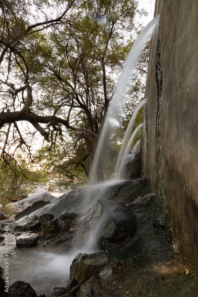 Wadi Tanuf Falls is one of the most beautiful places in Nizwa Stock ...