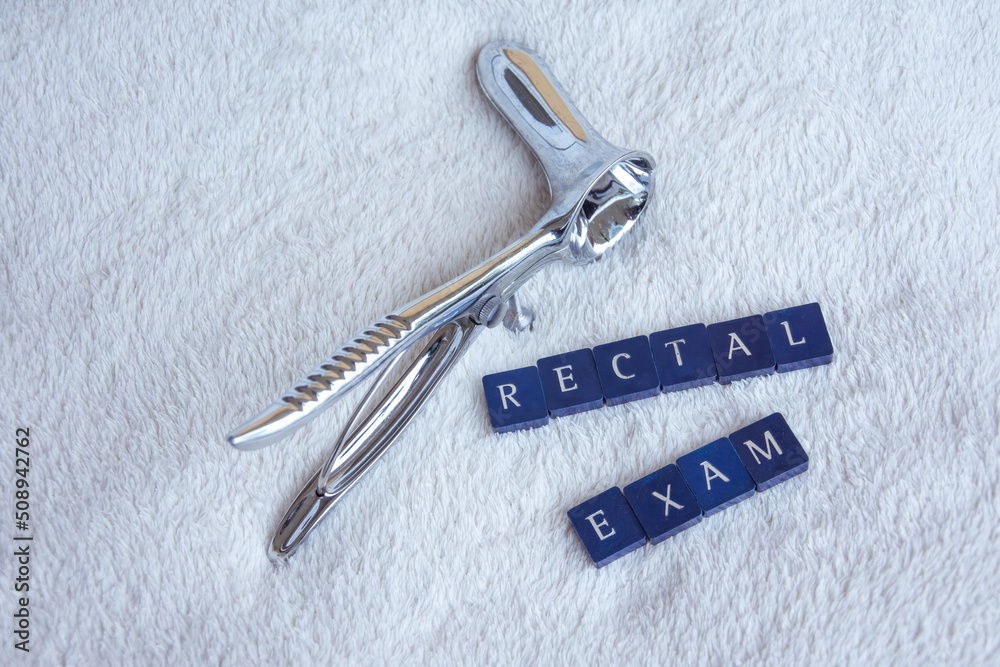 rectoscope with the words rectal exam on a white blanket Stock Photo ...