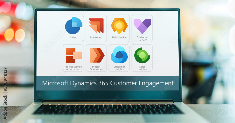 Laptop with icons of Microsoft Dynamics 365 Customer Engagement Stock ...