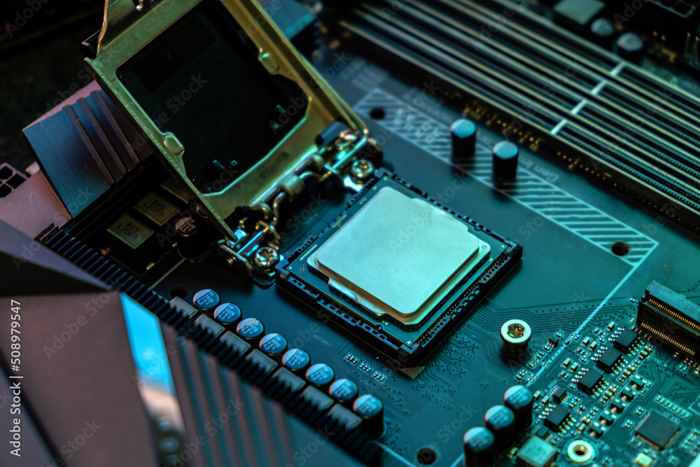 CPU chip on motherboard socket Stock Photo | Adobe Stock