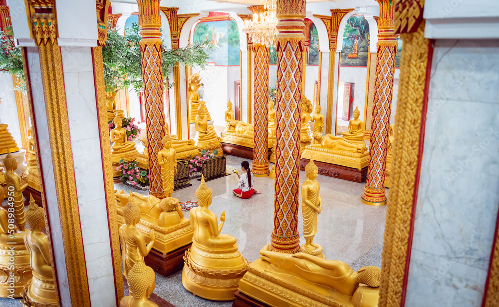 Beautiful Asian girl at big Buddhist temple dressed in traditional ...
