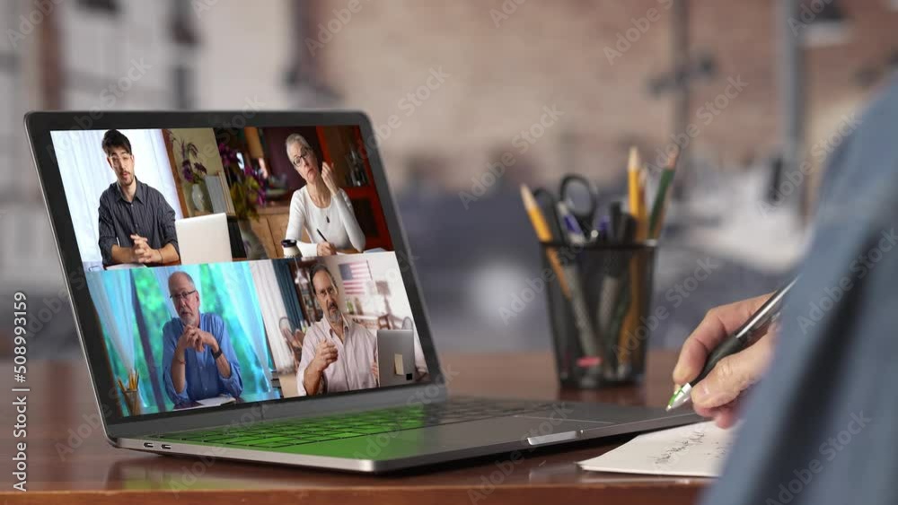 Vidéo Stock Over the shoulder shot of hand taking notes remote working ...