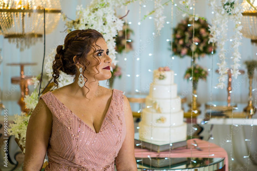 young brazilian bride at her wedding with decorated background, makeup ...