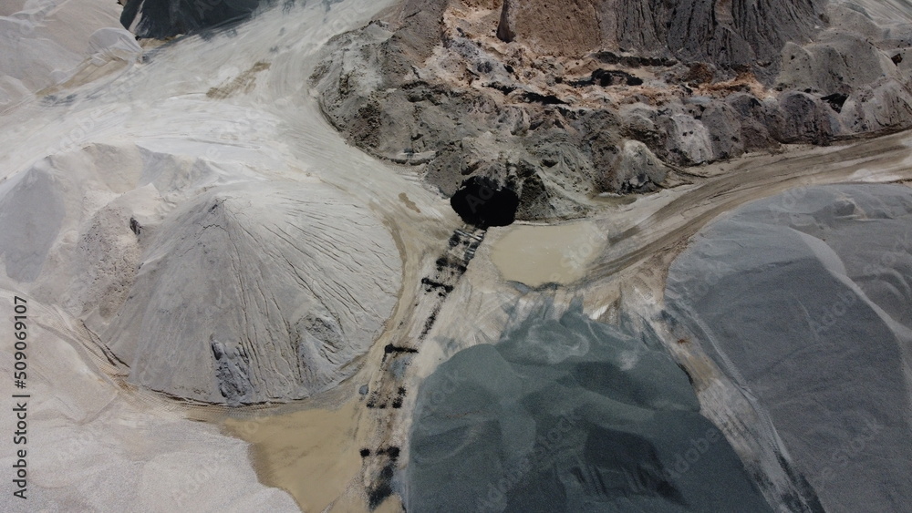 An aerial view of the piles of fine stone in the quarry. Fine stone is ...