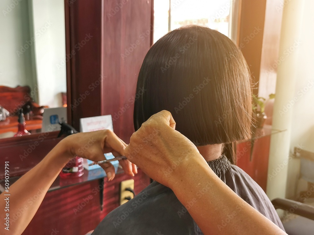 Barber use scissors cutting hair for Thai children before school begins ...