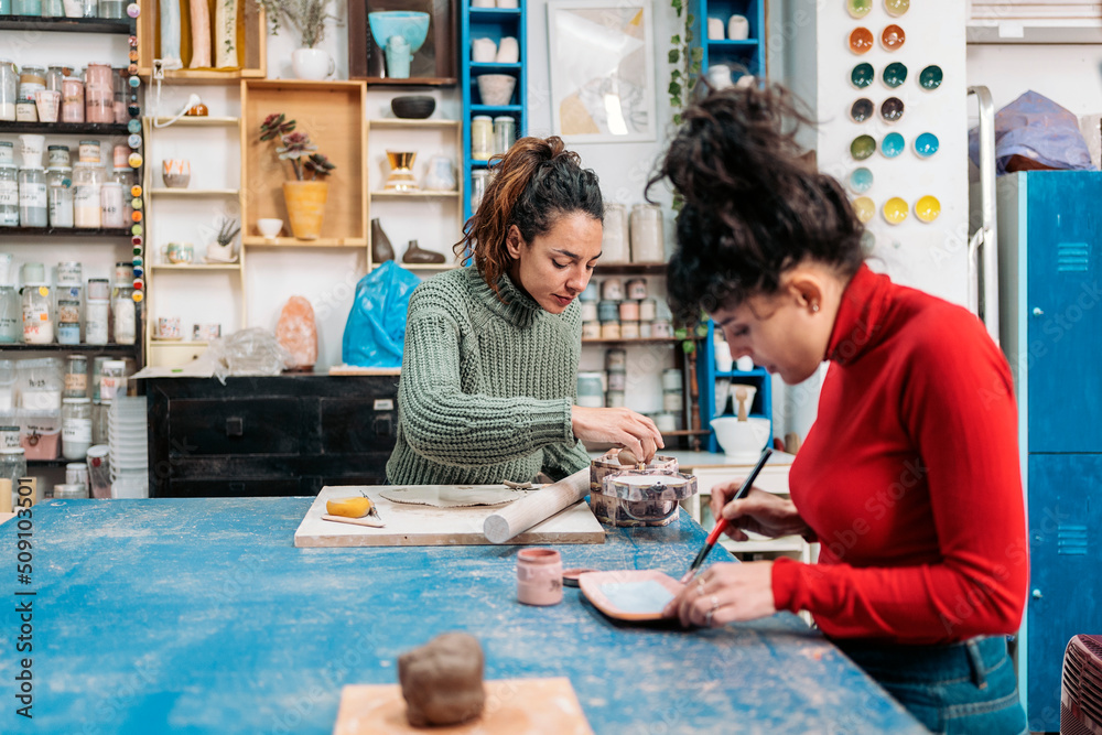 Learning in Pottery Class Stock Photo | Adobe Stock