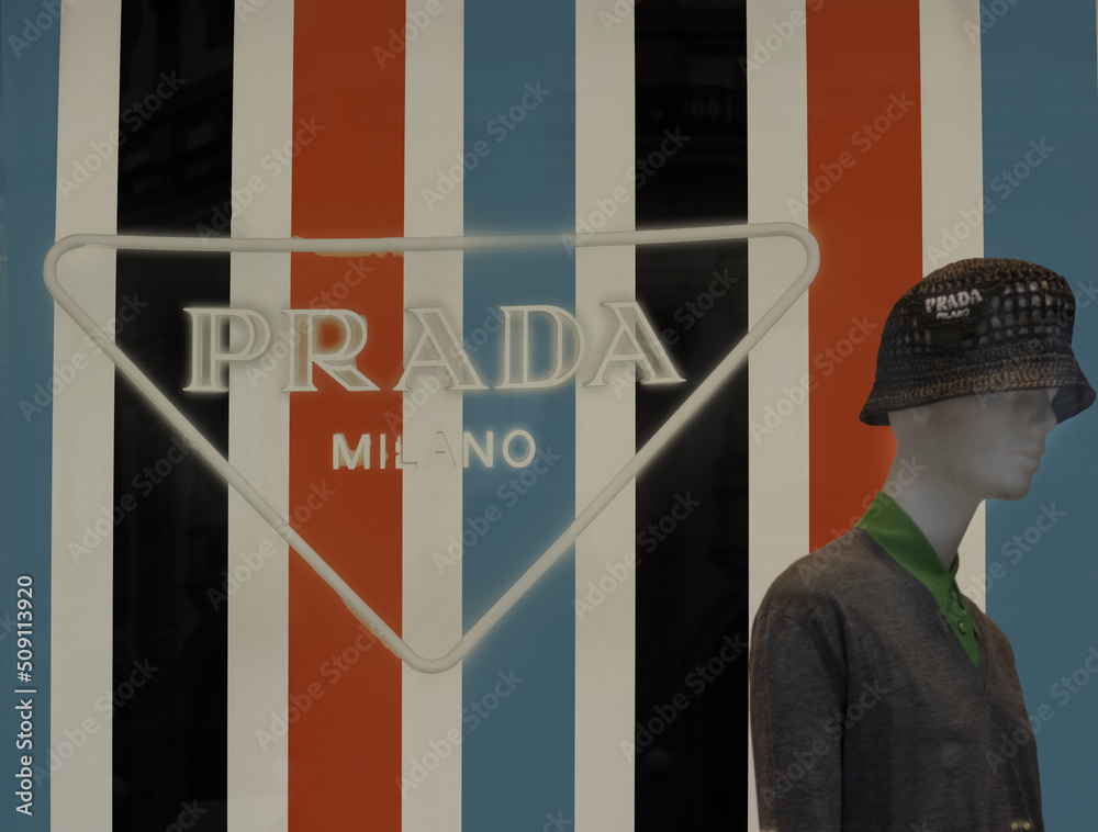 Prada Milano, logo and clothes in the shop window. May 07 2022 Milan ...