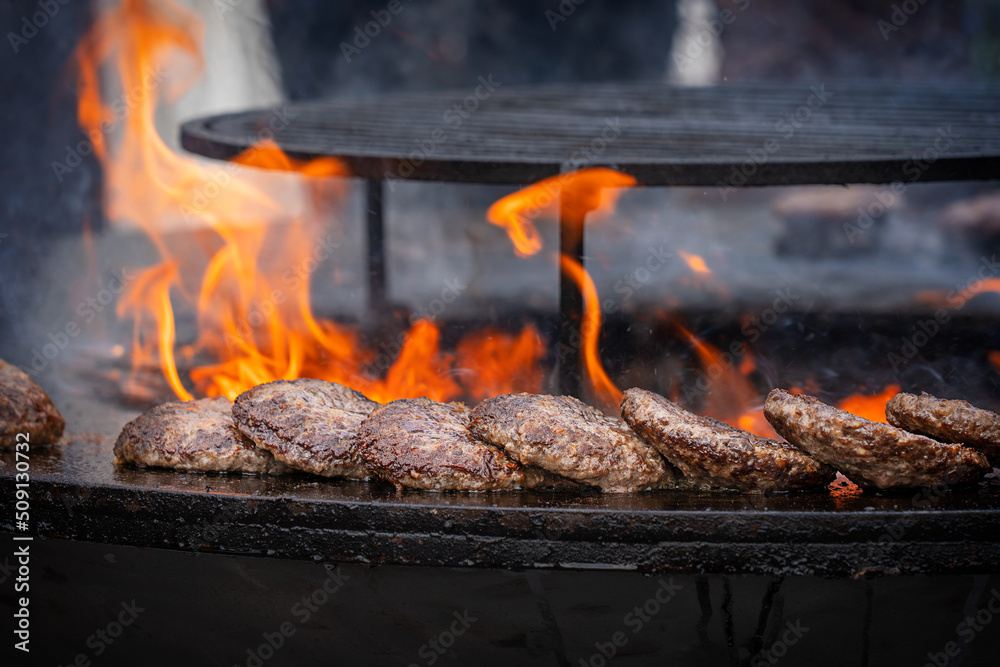 Bunch of patties flattened round, serving of minced ground beef meat ...