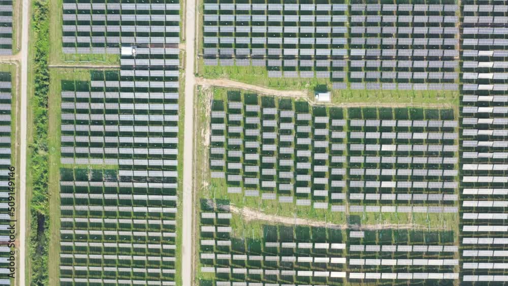 Solar farm, field or solar power plant in aerial view consist of ...