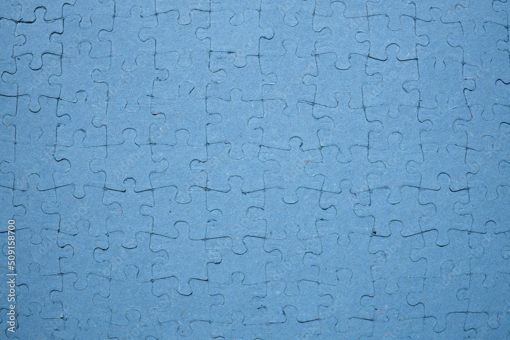 folded jigsaw puzzles background, reverse side of a picture folded from ...