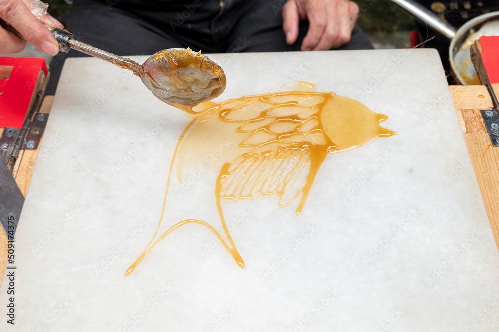 Chinese intangible cultural heritage traditional snack, sugar Guan Dao ...