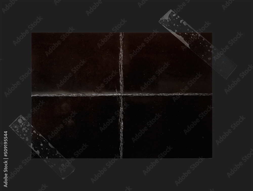 frontside of a folded black paper post card fixed by sticker isolated ...