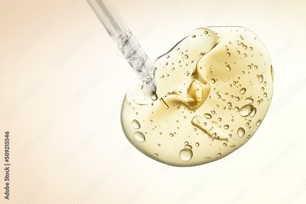 Vitamin C serum liquid texture with dropper on the desk Stock Photo ...