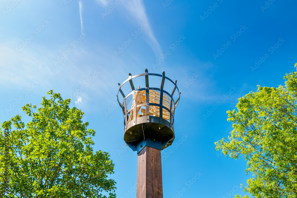 Newly installed park beacon seen with dry wooden pallets to be used as ...