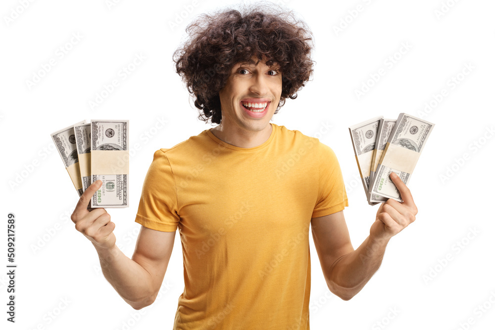 Smiling guy showing cash in front of camera Stock 写真 | Adobe Stock