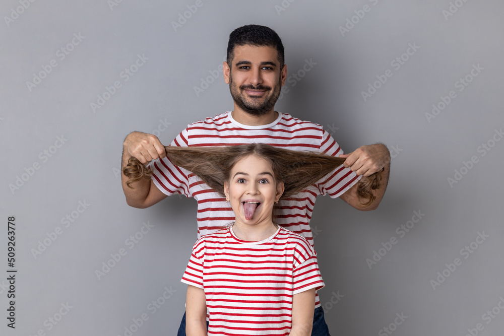 Portrait of happy funny father and daughter having fun, cute kid ...