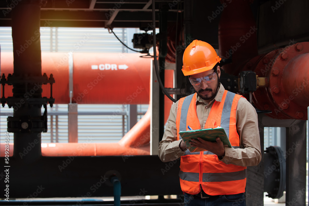 Engineer under checking the industry cooling tower air conditioner is ...