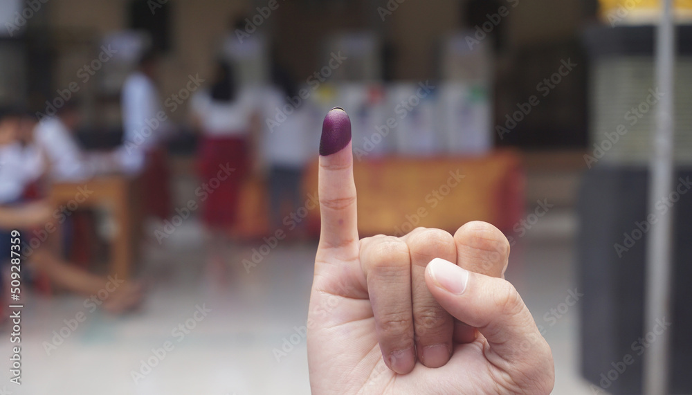 Purple ink on finger after presidential election in Indonesia. Stock ...