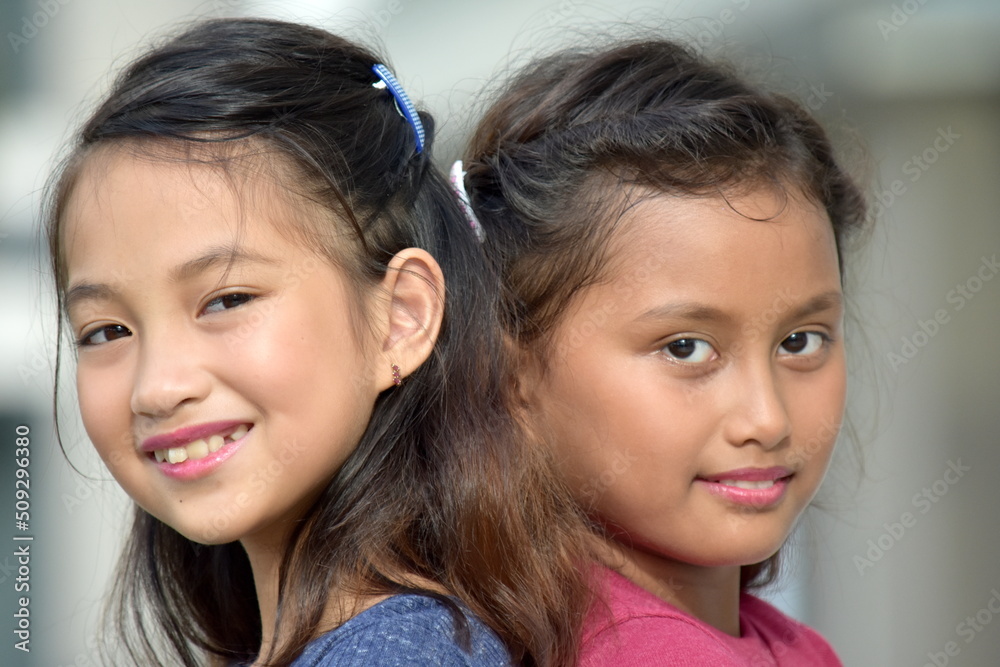 A Two Young Filipina Girl Friends Stock Photo | Adobe Stock