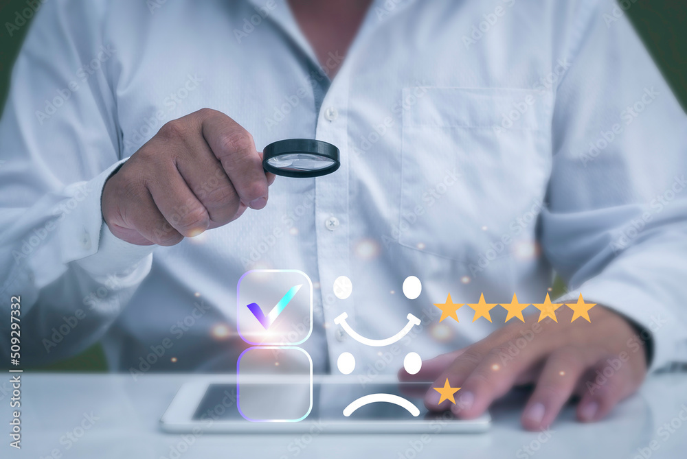 Customer Service Satisfaction Survey Concept. Businessman holding a ...