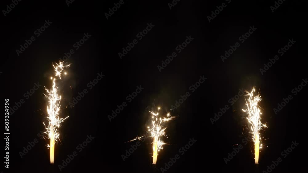 Beautiful firework fountains sparkling in the dark. A set of three ...