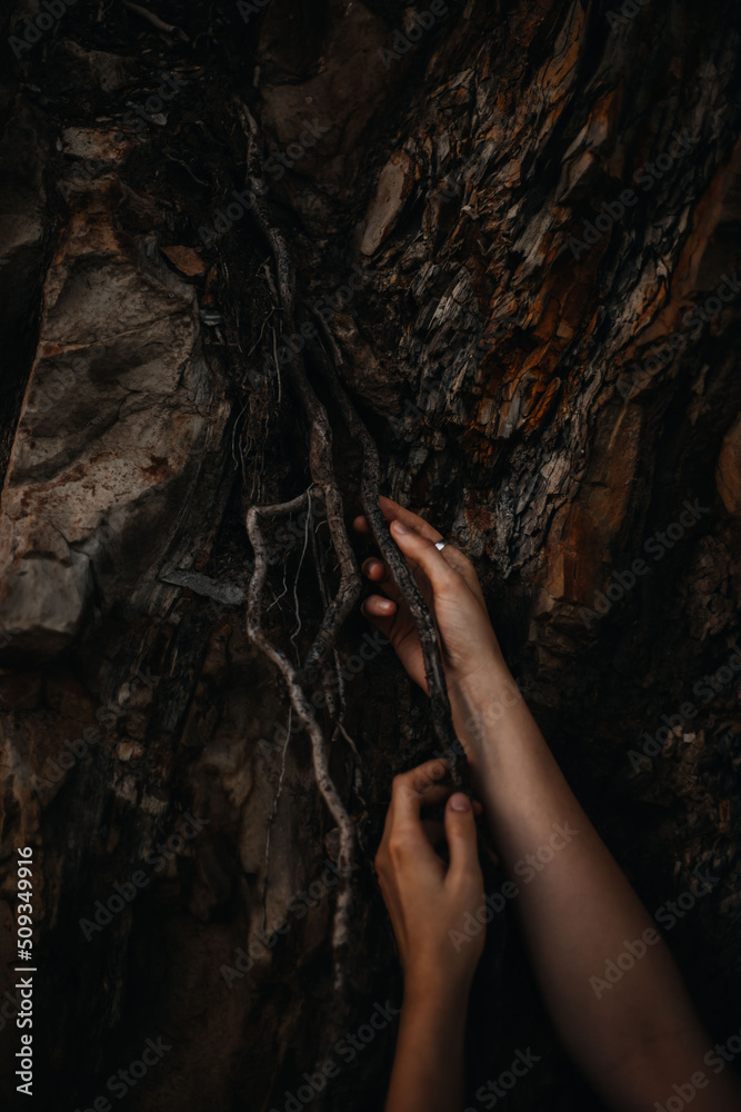 person in a cave in cave Stock Photo | Adobe Stock