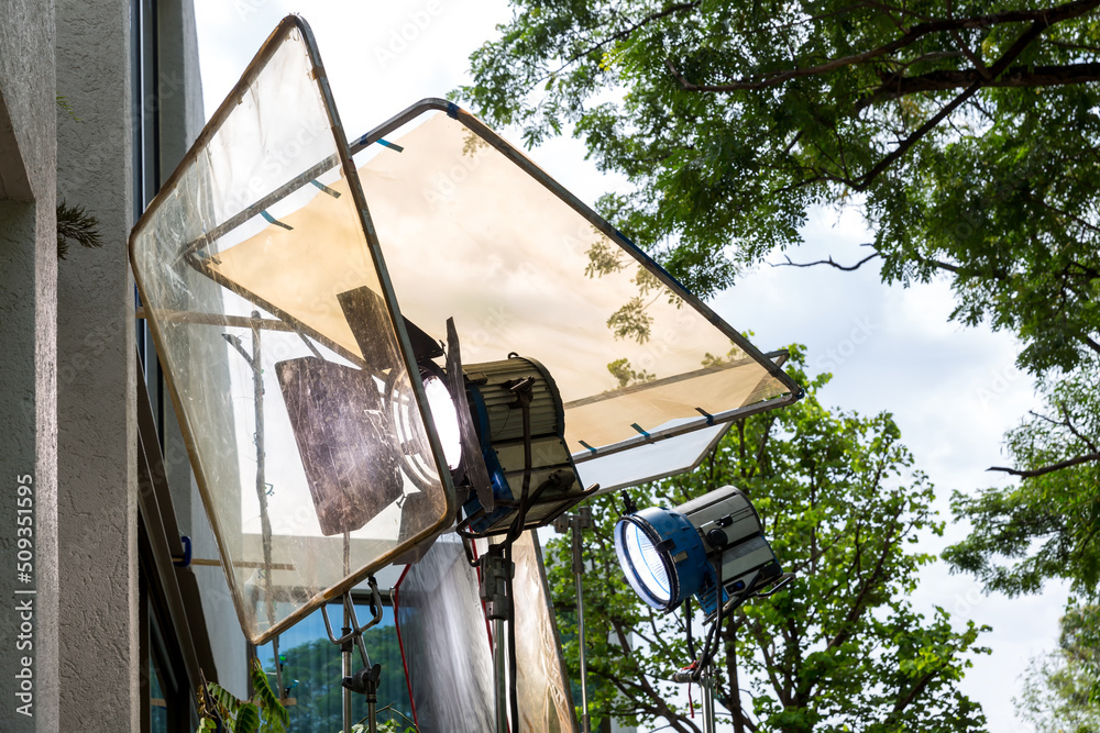 Process of filming. Spotlight illuminates. Movie set with many lamps ...