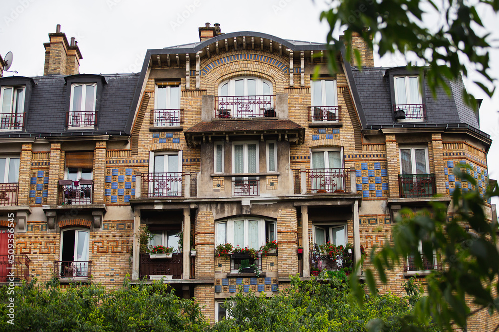 Paris, France - May 29, 2022: Facade of an old Parisian house of ...