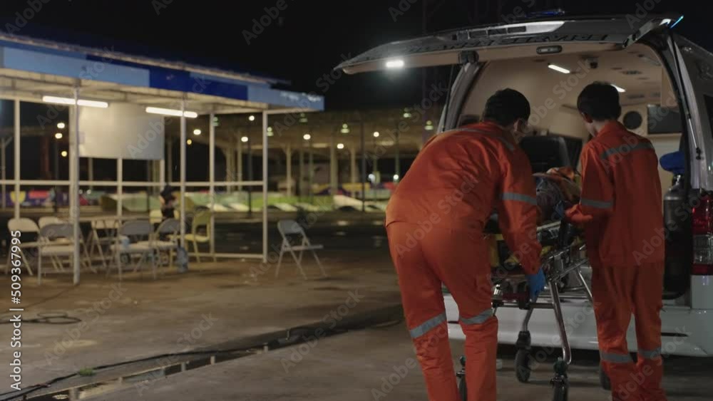 Video Stock Male and female emergency medical team quickly rushed to ...