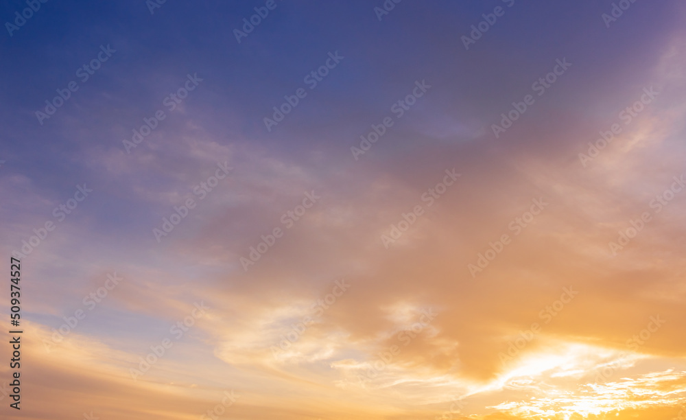 Colorful sunset sky background in the evening with orange sunlight ...