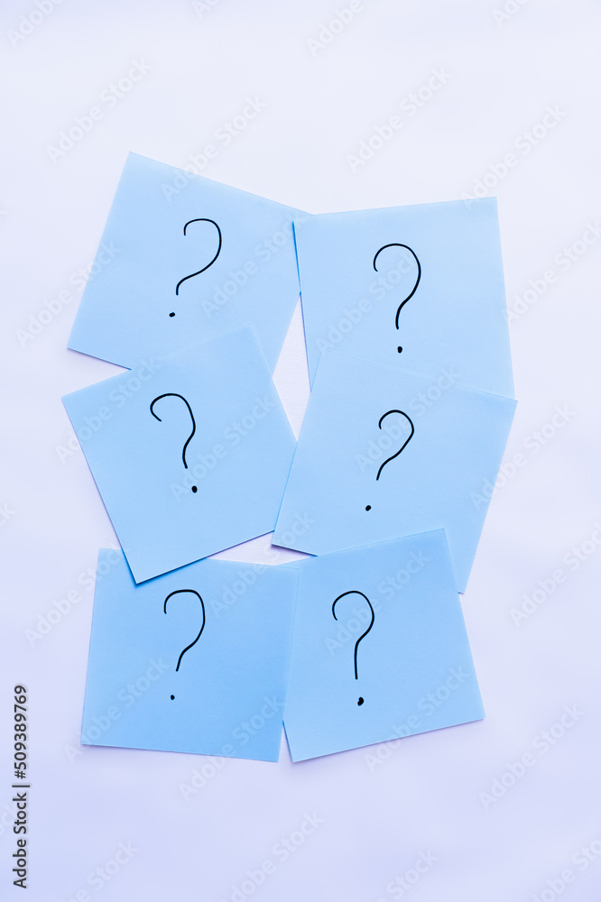 top view of blue cards with question marks on white background. Stock ...