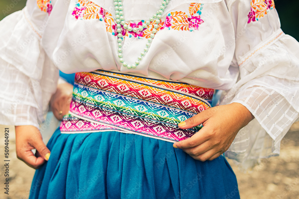Ecuadorian indigenous men and women dressed in their typical costumes ...