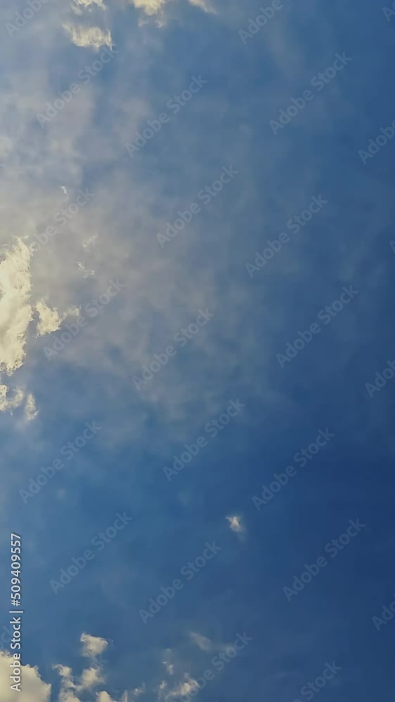 Looking up at a beautiful Summer sky with thick, heavy clouds moving ...