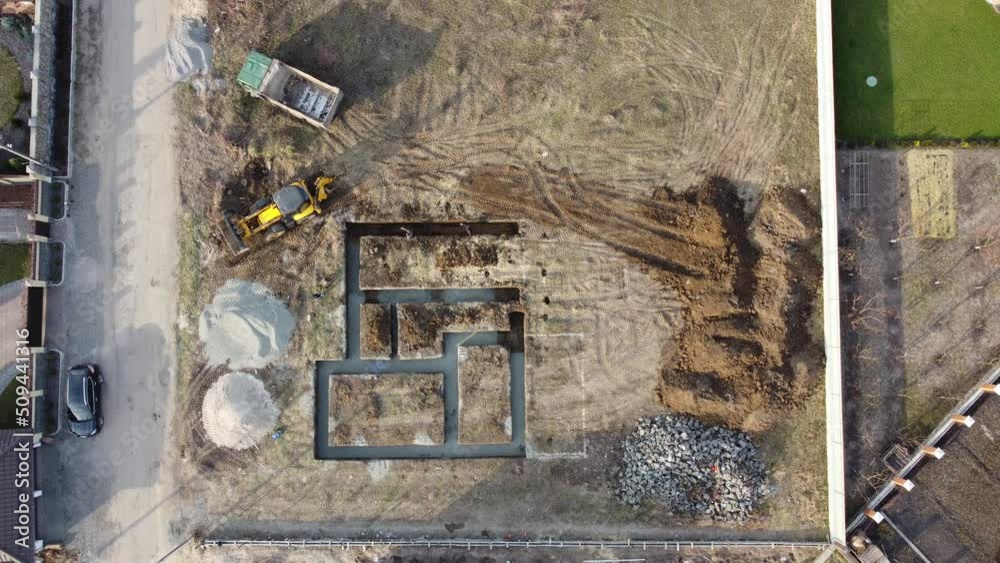 Aerial drone top down view on construction site with reinforced ...