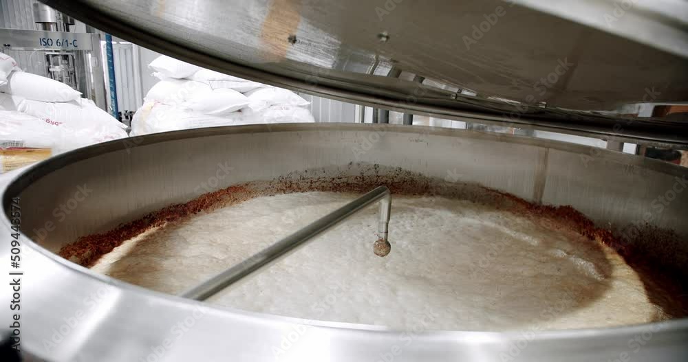 Huge steel tanks for beer brewing. Making in craft brewery, Kettle with ...