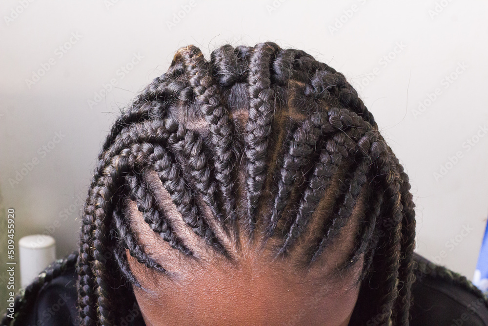 Young afro with Boxer braids, African hair style also known as ...