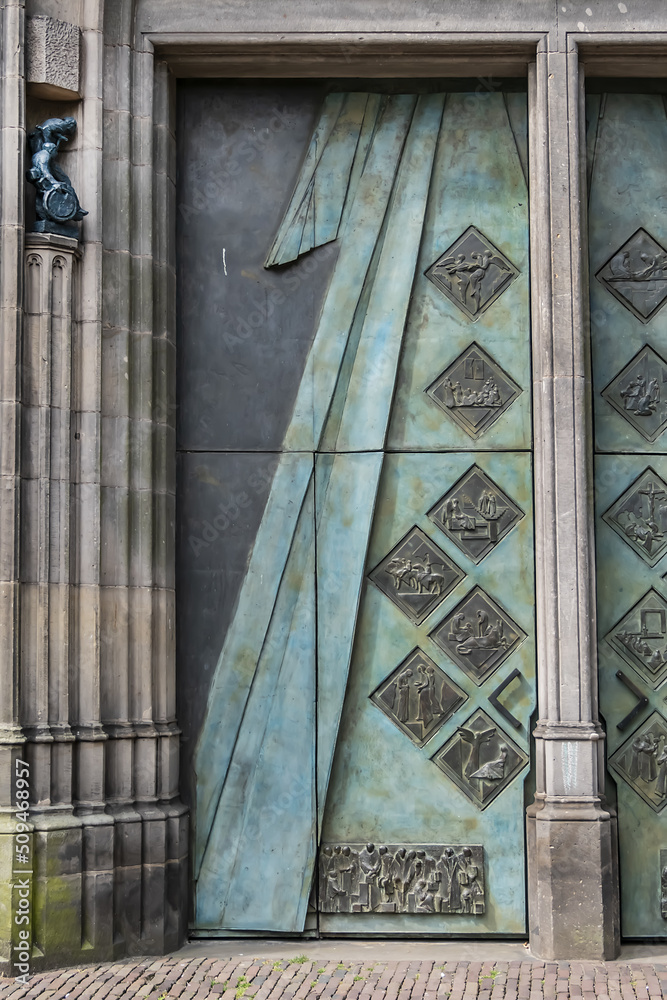 Entrance door to 98-meter high Onze Lieve Vrouwetoren (Our Lady tower ...