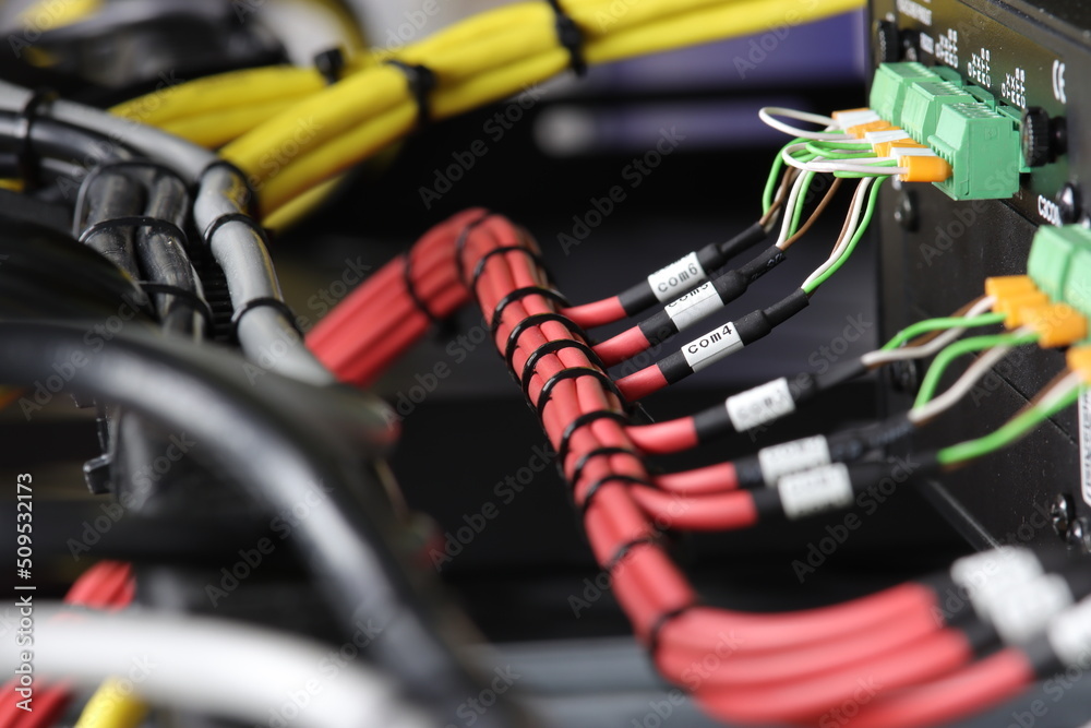 Insulated mounting wires tied with plastic ties in the electrical panel ...