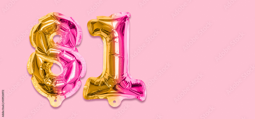 Rainbow foil balloon number, digit eighty one on a pink background ...